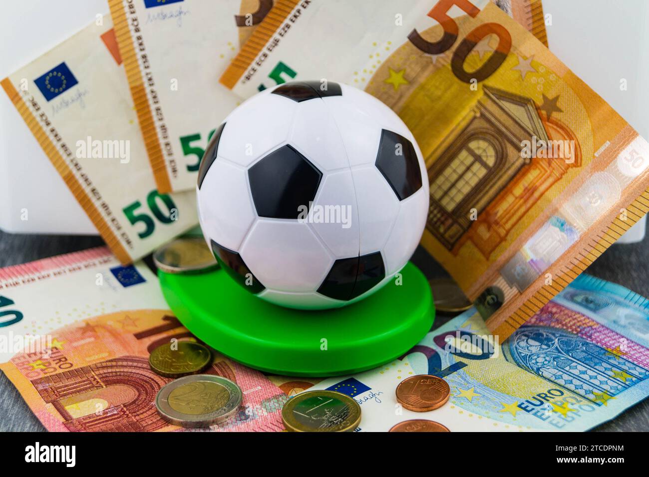 football with Euro bills Stock Photo - Alamy