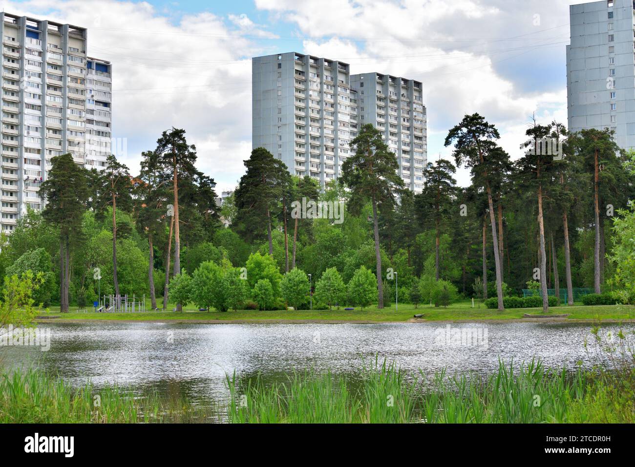 Multi-storey residential buildings on the shore of Shkolnoye Lake in ...
