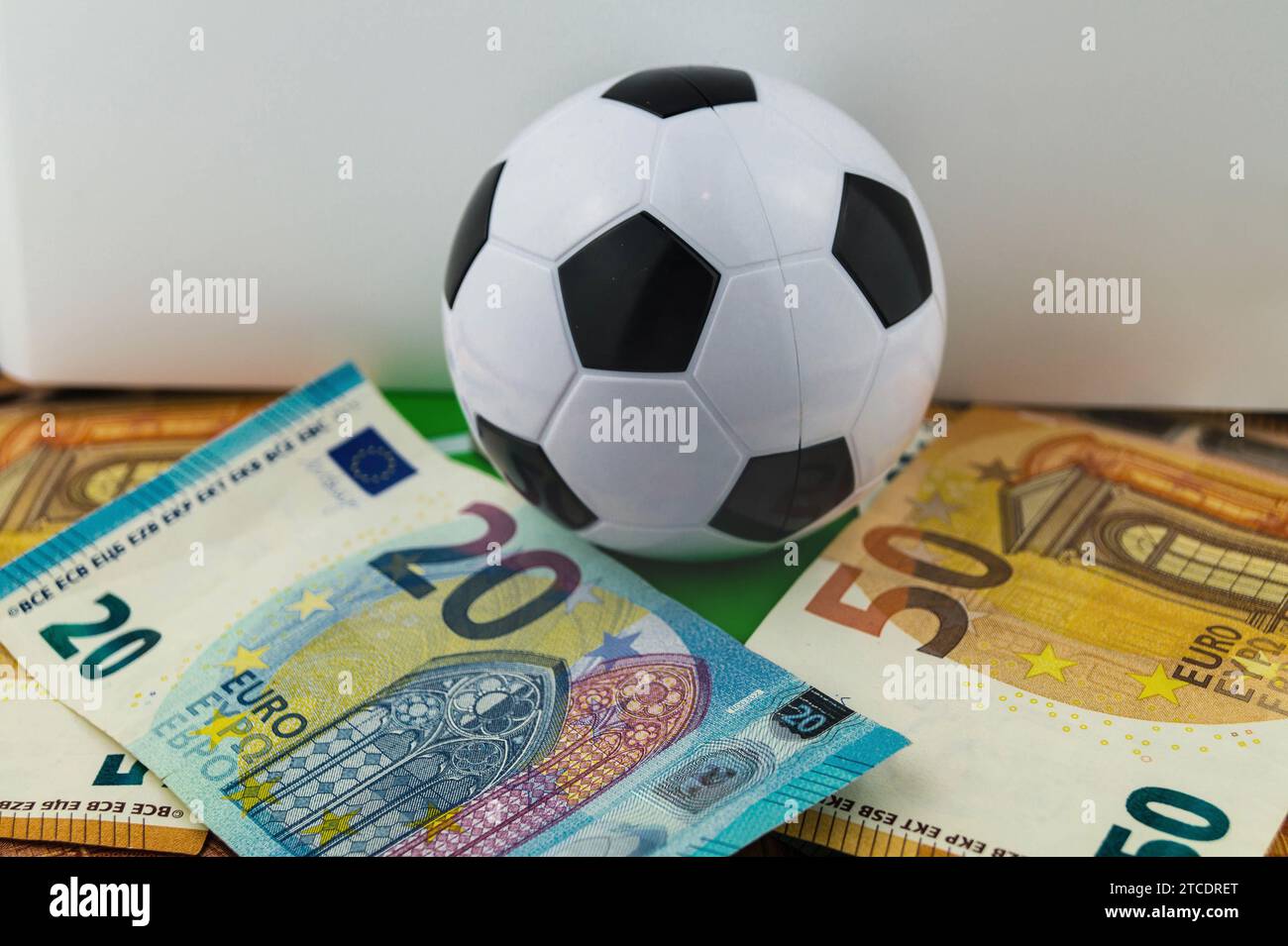 football with Euro bills Stock Photo - Alamy