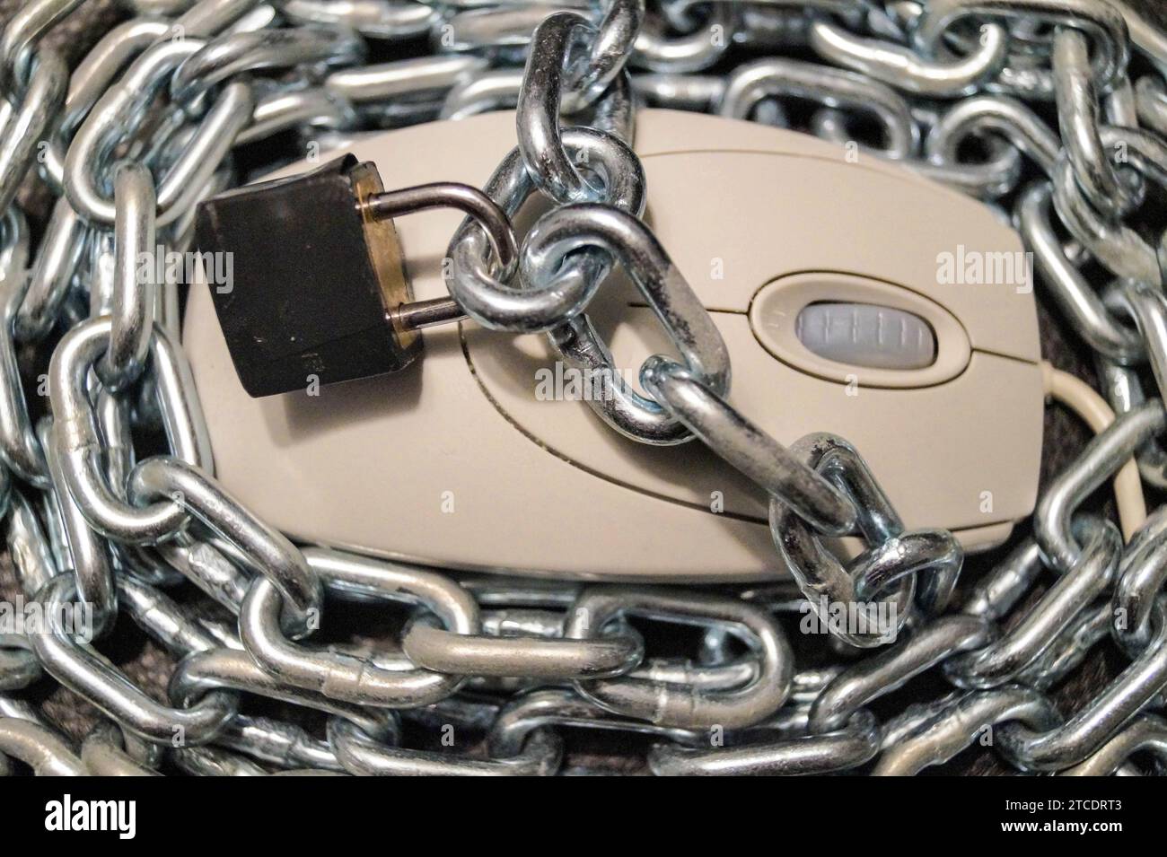 PC mouse with chain and security lock, symbol picture for data privacy ...