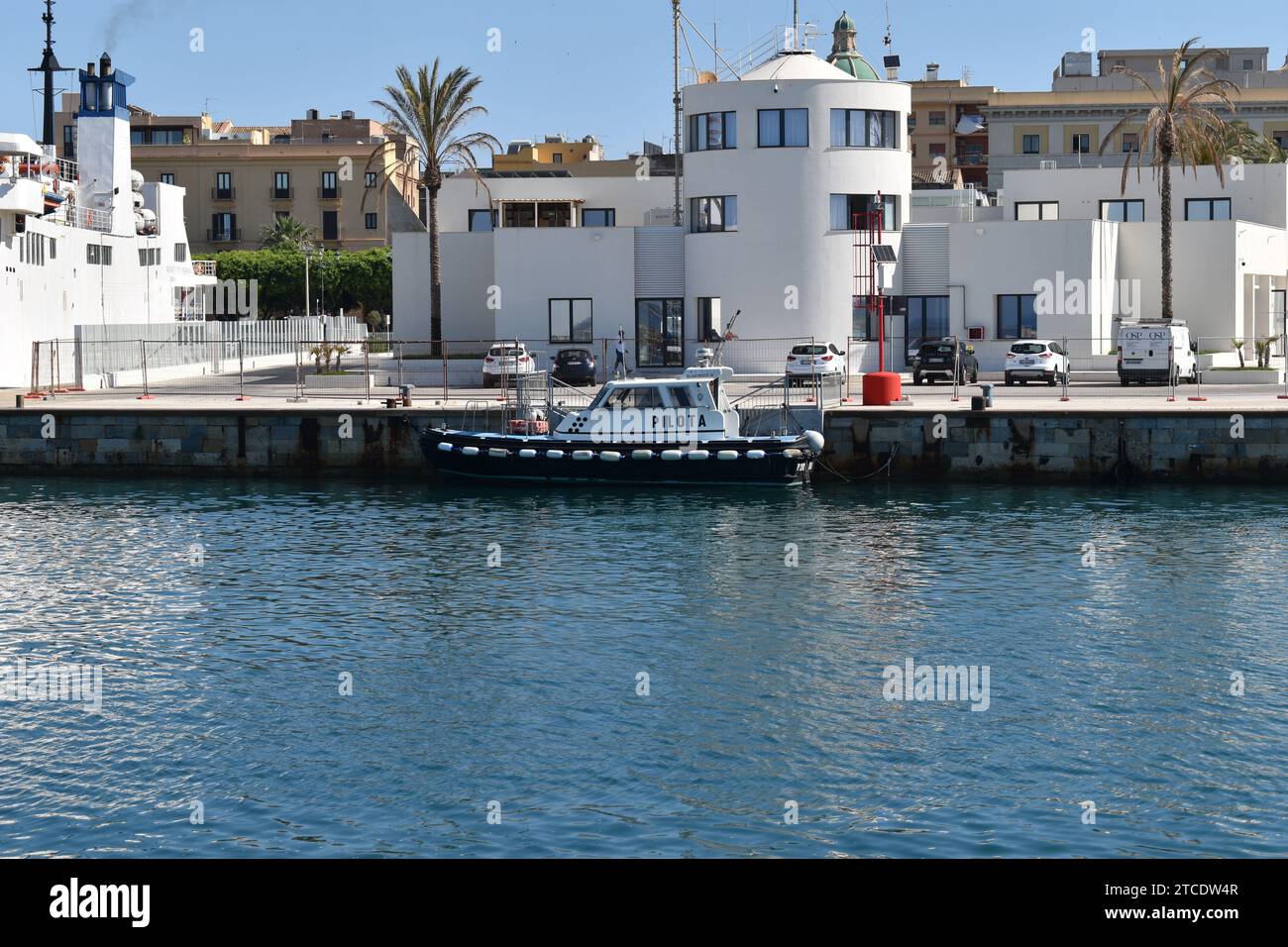 Maritime pilot boat docked in the port of Trapani Stock Photo - Alamy