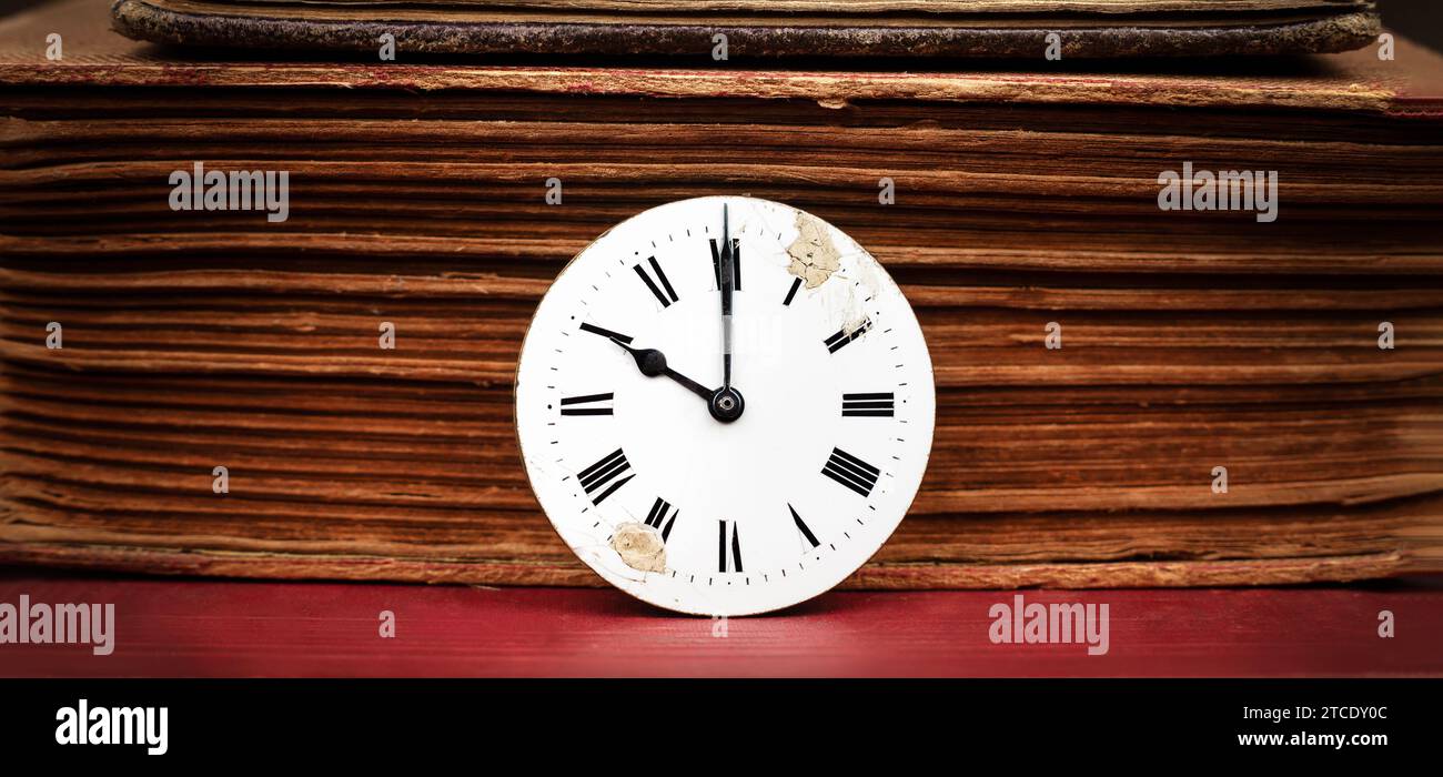 Old book and antique clock face. Storytelling, story teller, time ...