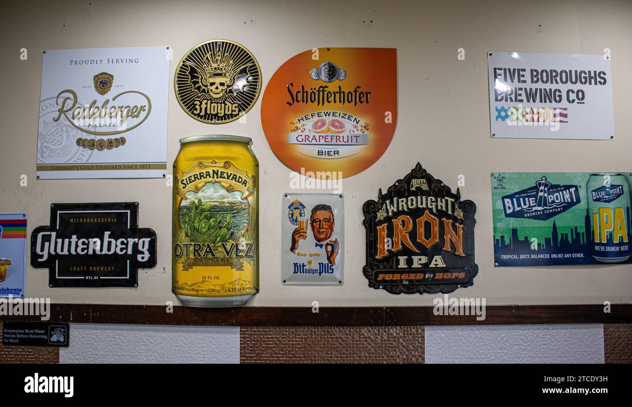 A close-up shot of a wall in an old bar, featuring an eclectic mix of ...