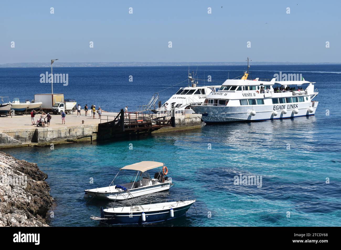 Two cruise boats "La Conia" and "Vieste II" docked in the port of the ...