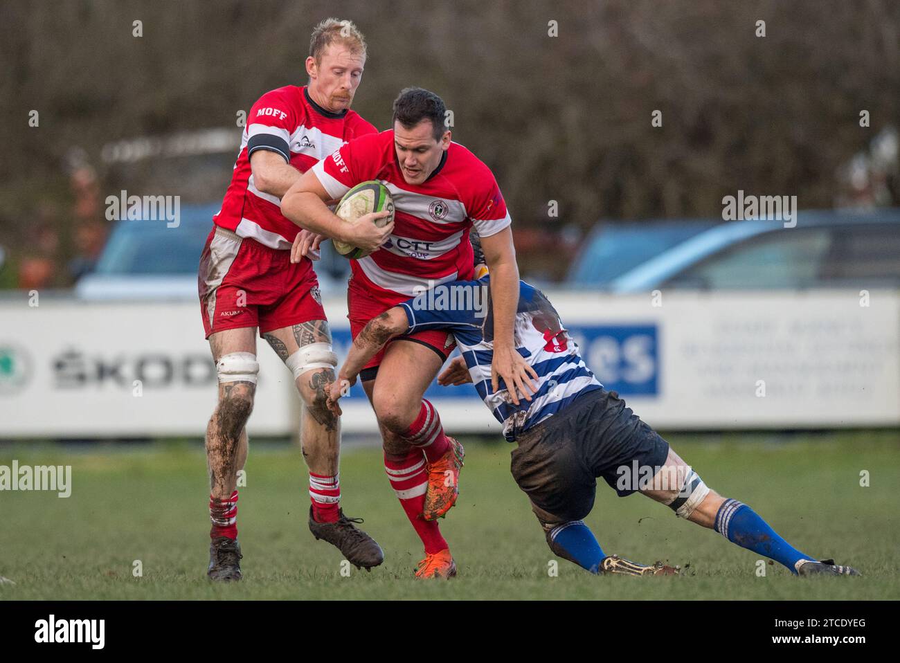 English amateur Rugby Union players playing in a league game wet and ...