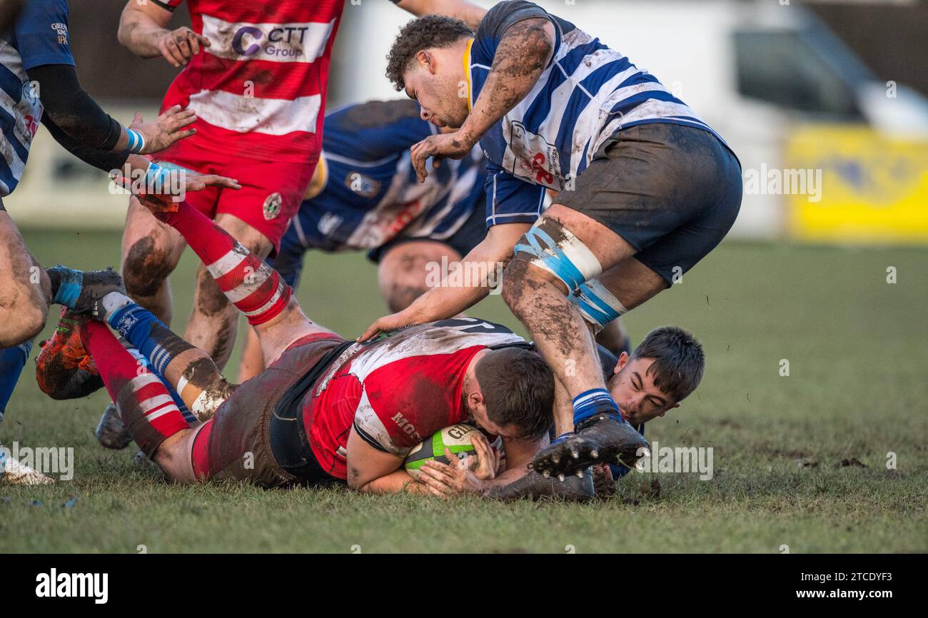 English amateur Rugby Union players playing in a league game wet and ...