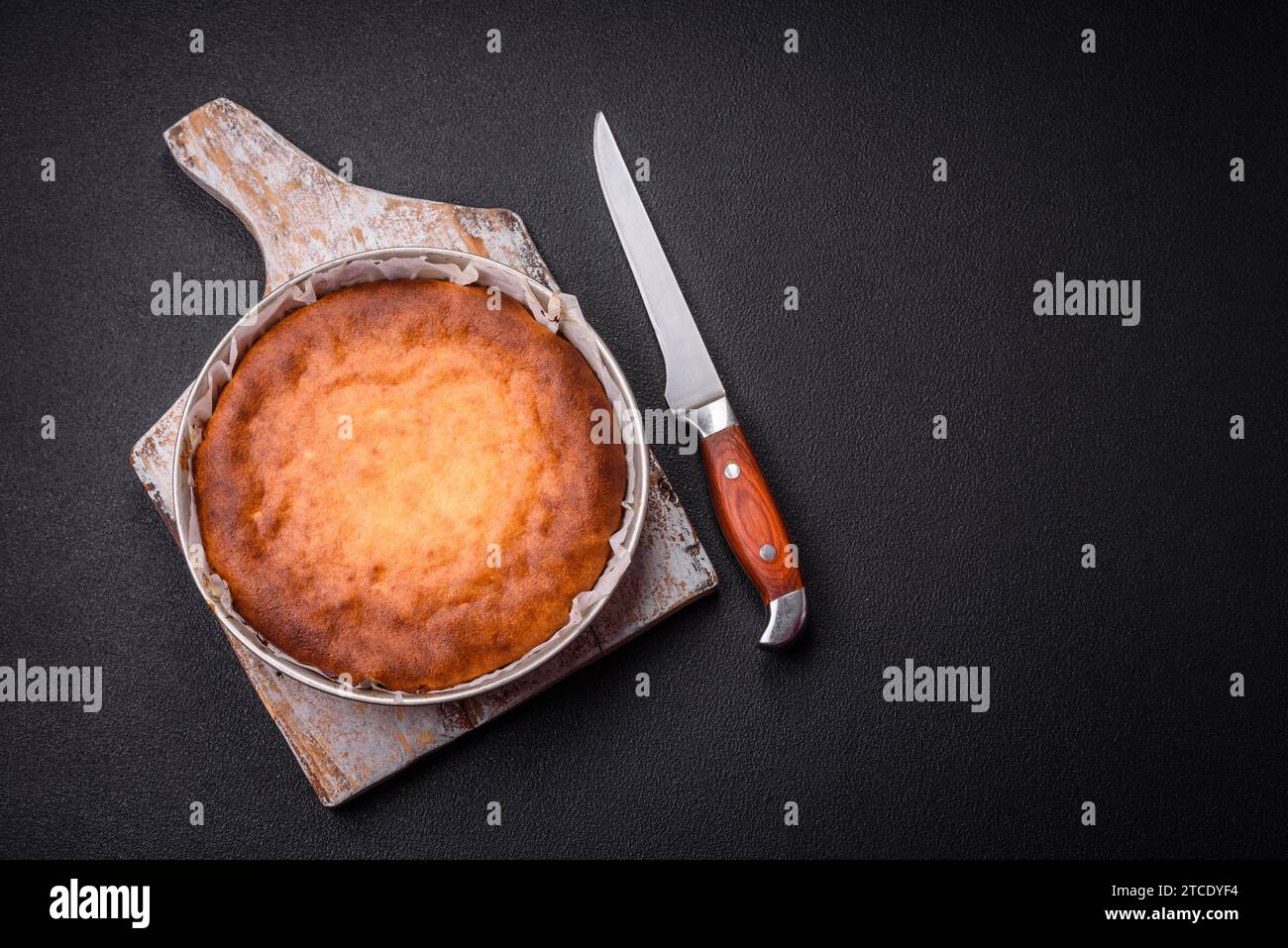 Delicious homemade round baked mince pie or tart on textured concrete ...