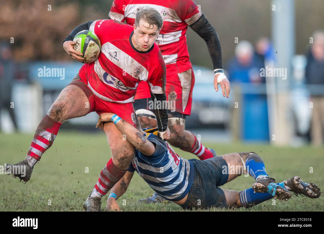 English amateur Rugby Union players playing in a league game wet and ...