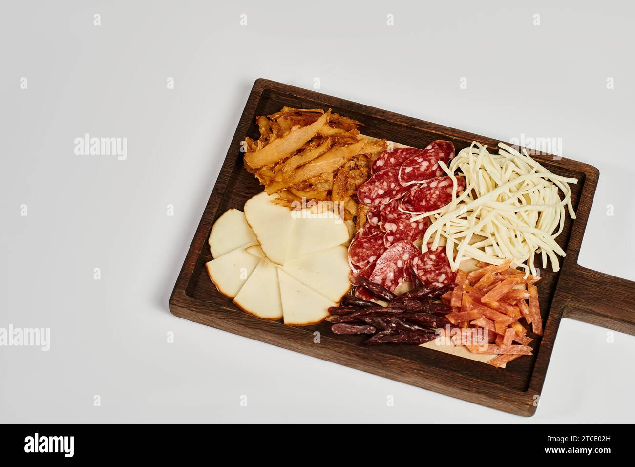 party charcuterie board with gourmet cheese platter, dried beef and ...