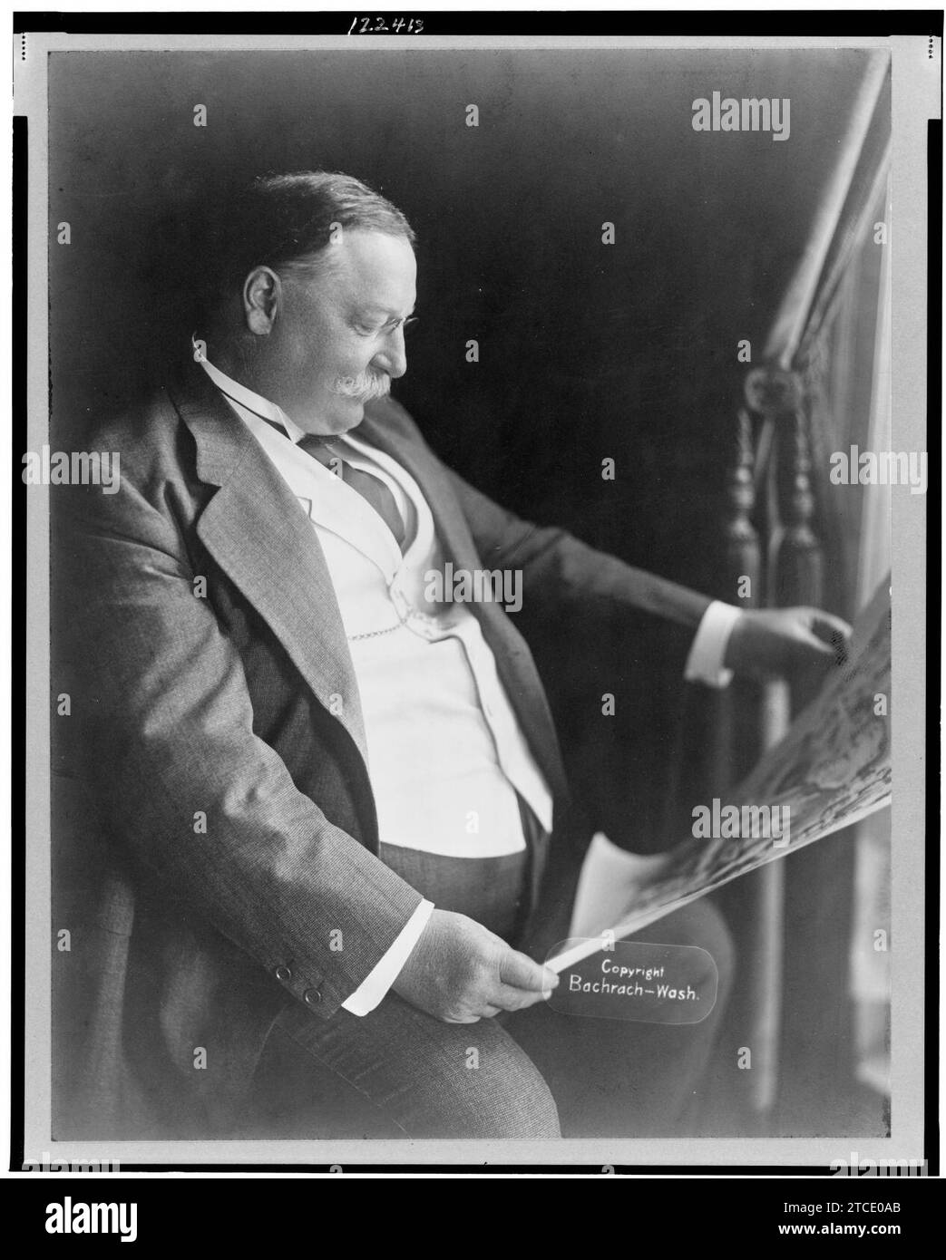 William Howard Taft, three-quarter length portrait, seated, facing ...