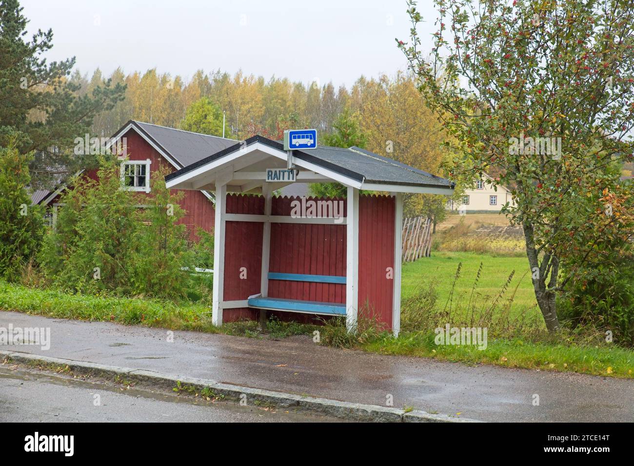 Red wooden bus stop hi-res stock photography and images - Alamy