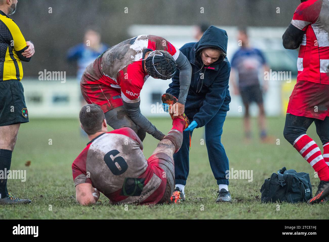 English amateur Rugby Union player recieving first aid treatment whilst ...