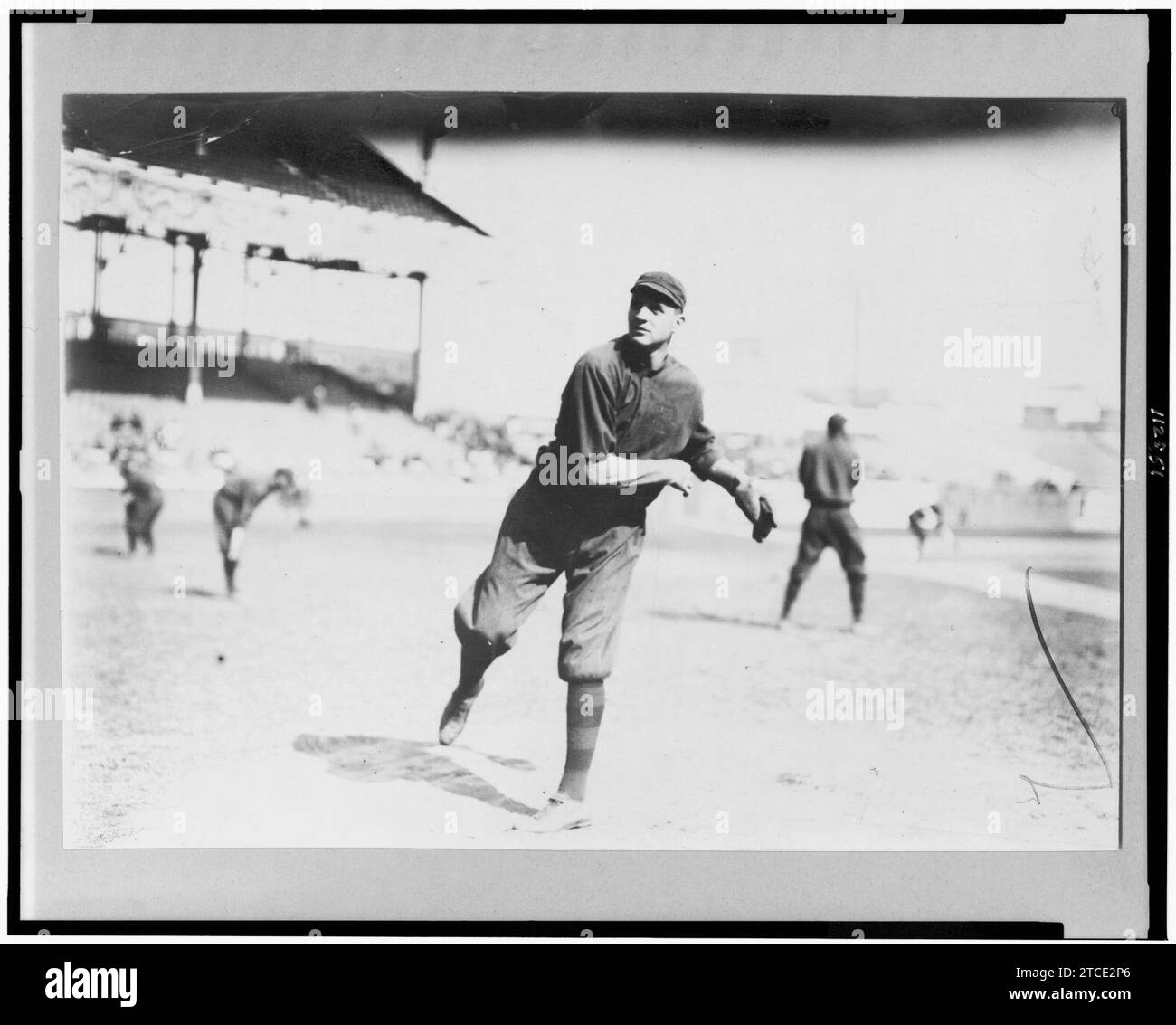 William Lawrence James, Boston NL baseball player, throwing ball on ...