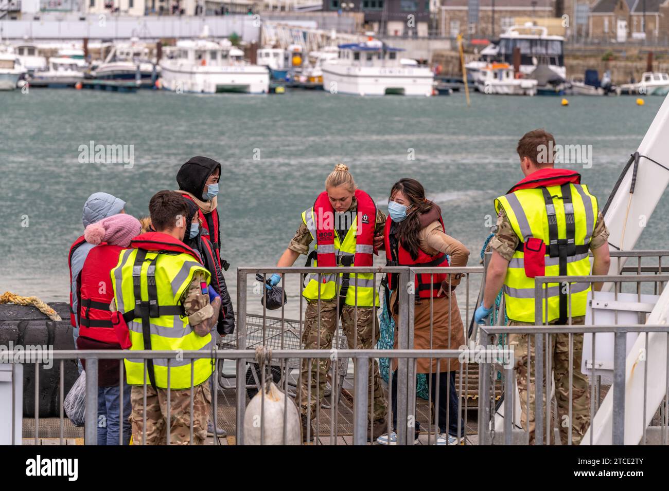 Migrants arriving, Port of Dover, Kent, Britain. 1st June 2022. Members of the Royal Navy help ...