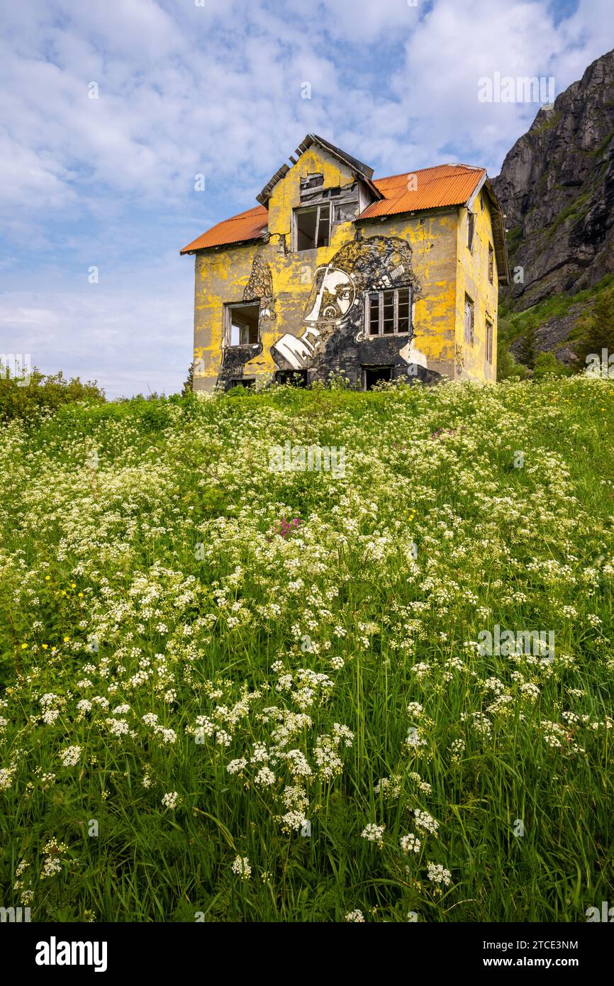 Derelict House decorated with gas mask wearing portrait on Gimsøy ...