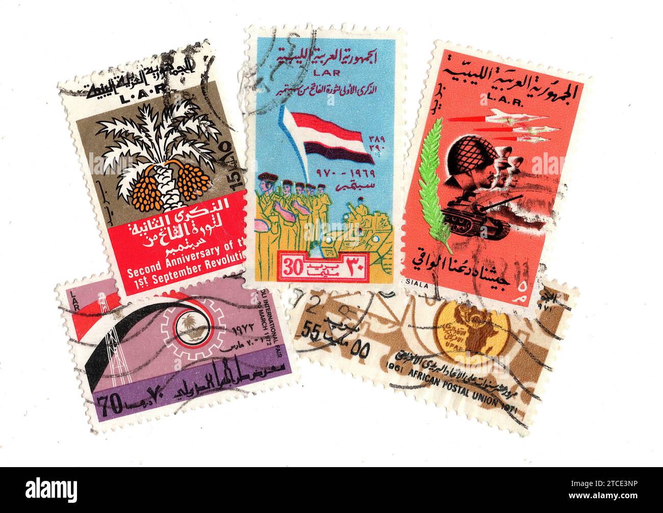 A montage of vintage postage stamps from Libya isolated on a white ...