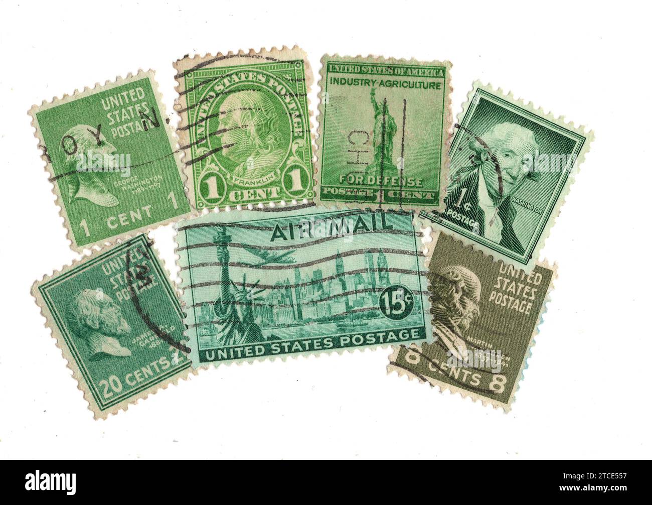 A montage of green vintage postage stamps from the USA isolated on a ...