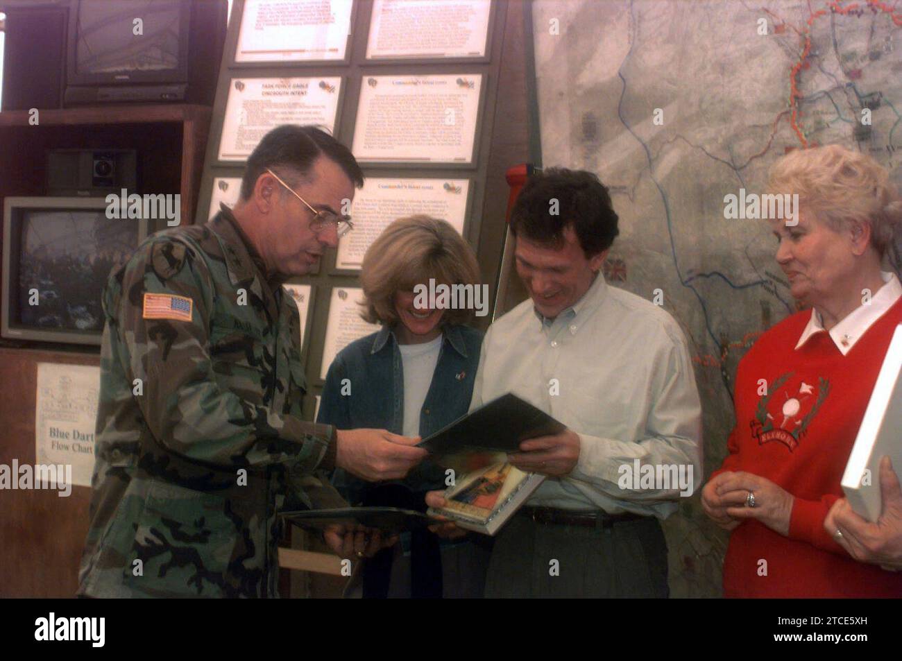 William Nash presents Tom Daschle a souvenir of their Easter Sunday ...