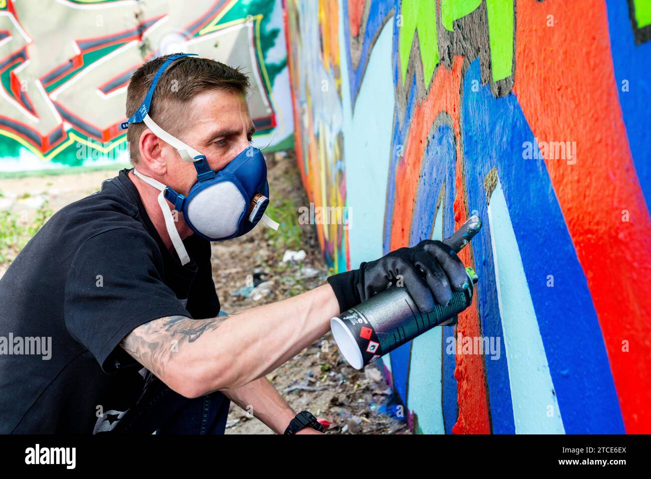 Berlin, Germany. Graffiti artist creating jet another piece of urban ...