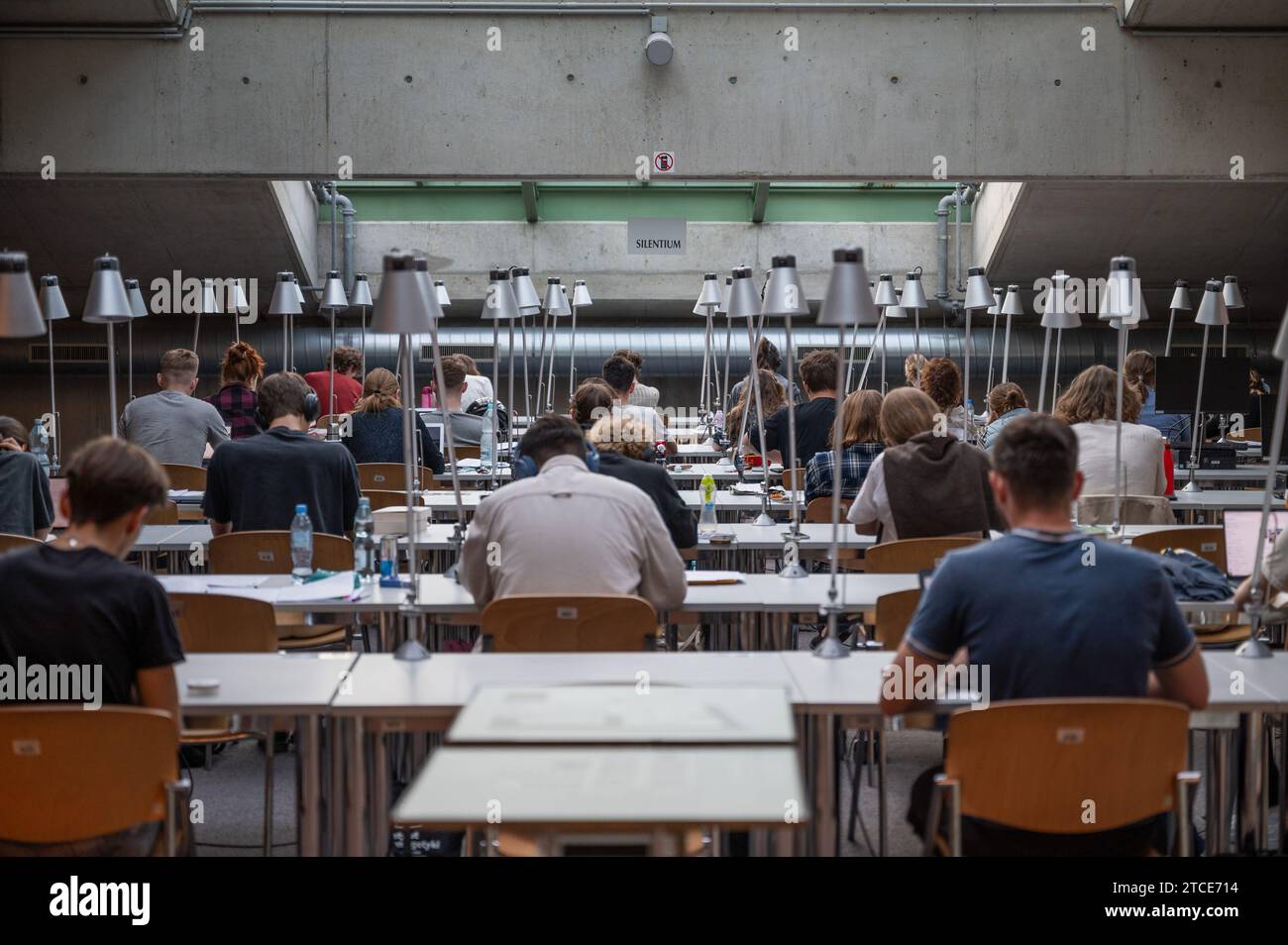 Man reading book from behind hi-res stock photography and images - Alamy