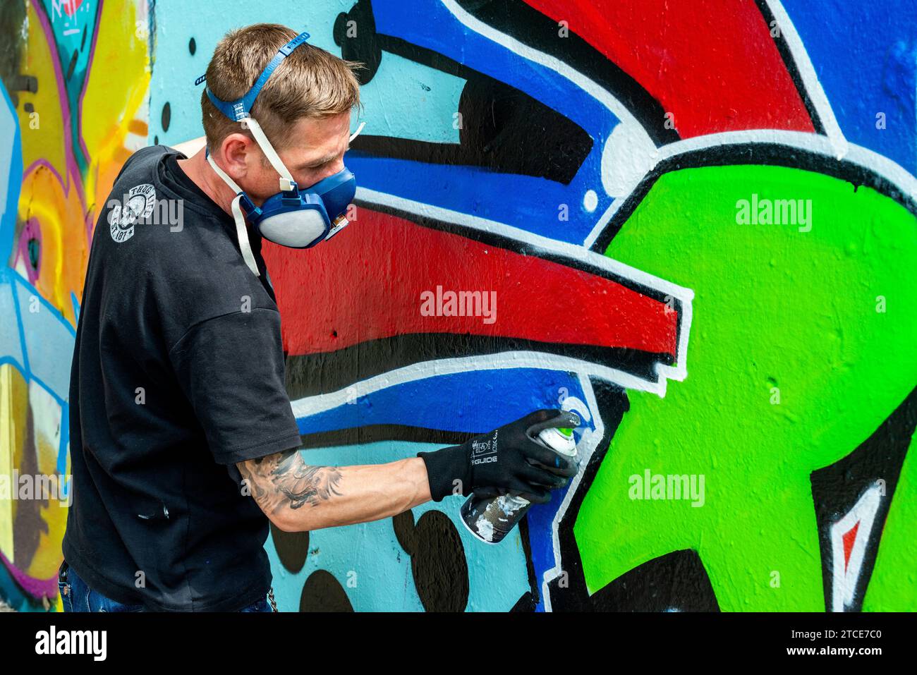 Berlin, Germany. Graffiti artist creating jet another piece of urban ...