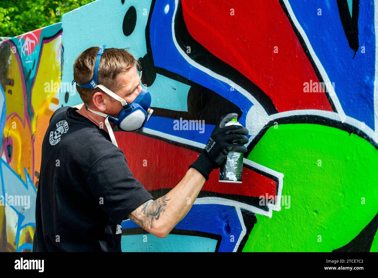 Berlin, Germany. Graffiti artist creating jet another piece of urban ...