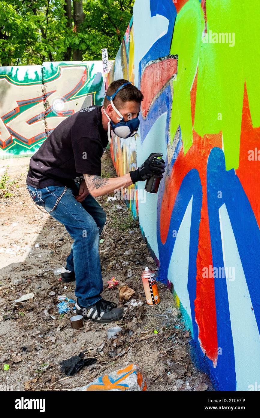 Berlin, Germany. Graffiti artist creating jet another piece of urban ...