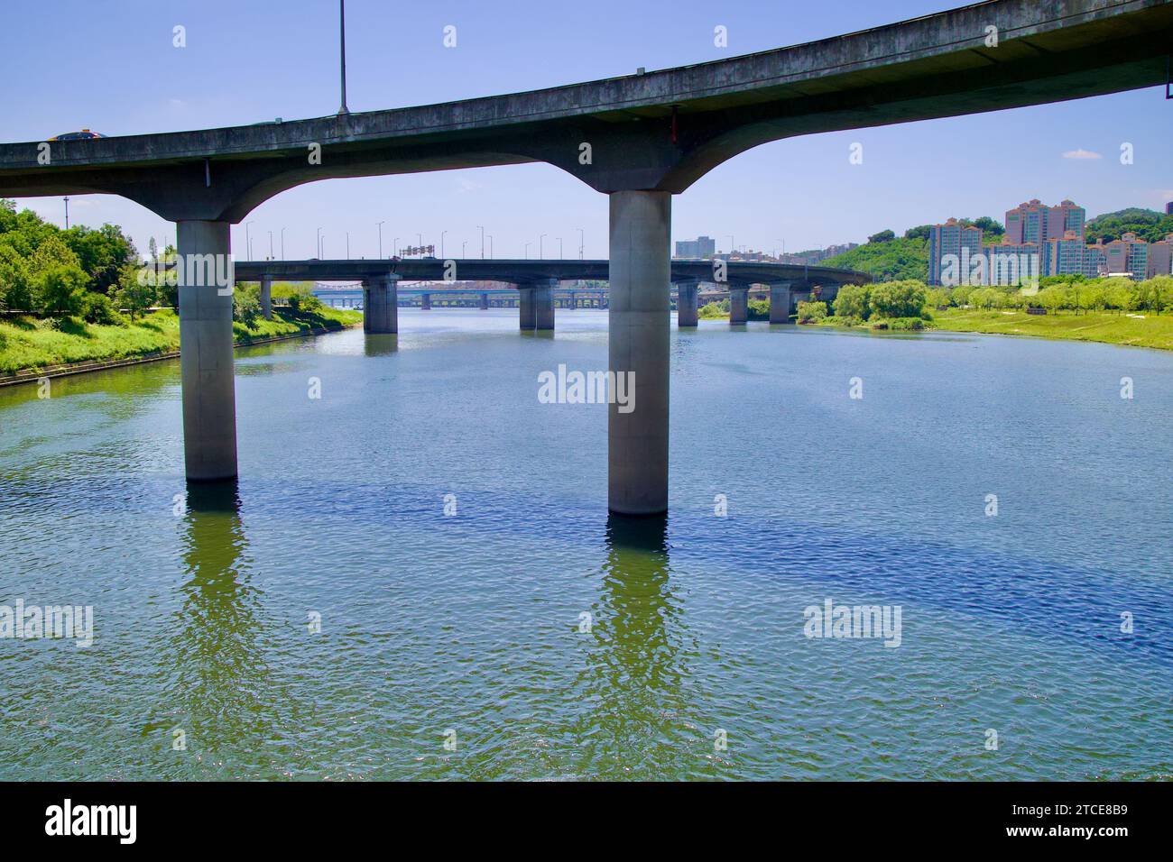 Bridges elegantly span across Jungnang Stream in Seoul, creating picturesque crossings as the ...