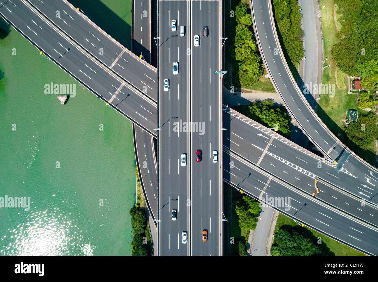 Aerial drone view of highway multi-level junction road with moving cars ...