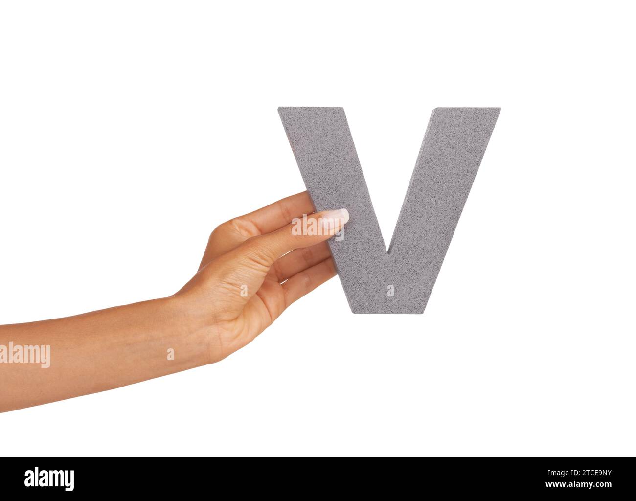 Hands, font and capital letter V in studio isolated on a white ...