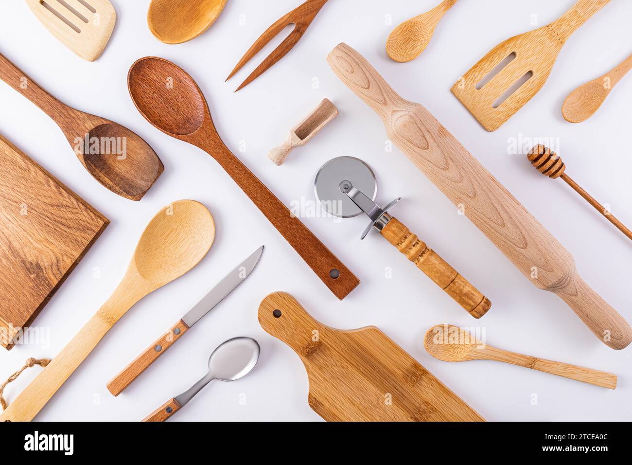 Kitchen wooden utensils, cooking tools on white background. Flat ...