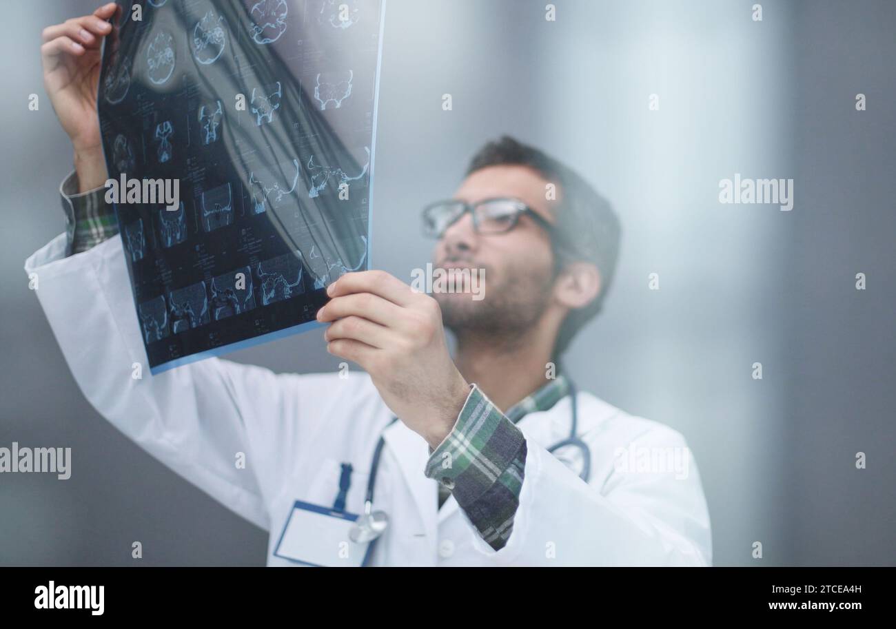 Brain disease diagnosis with medical doctor seeing Magnetic Resonance ...