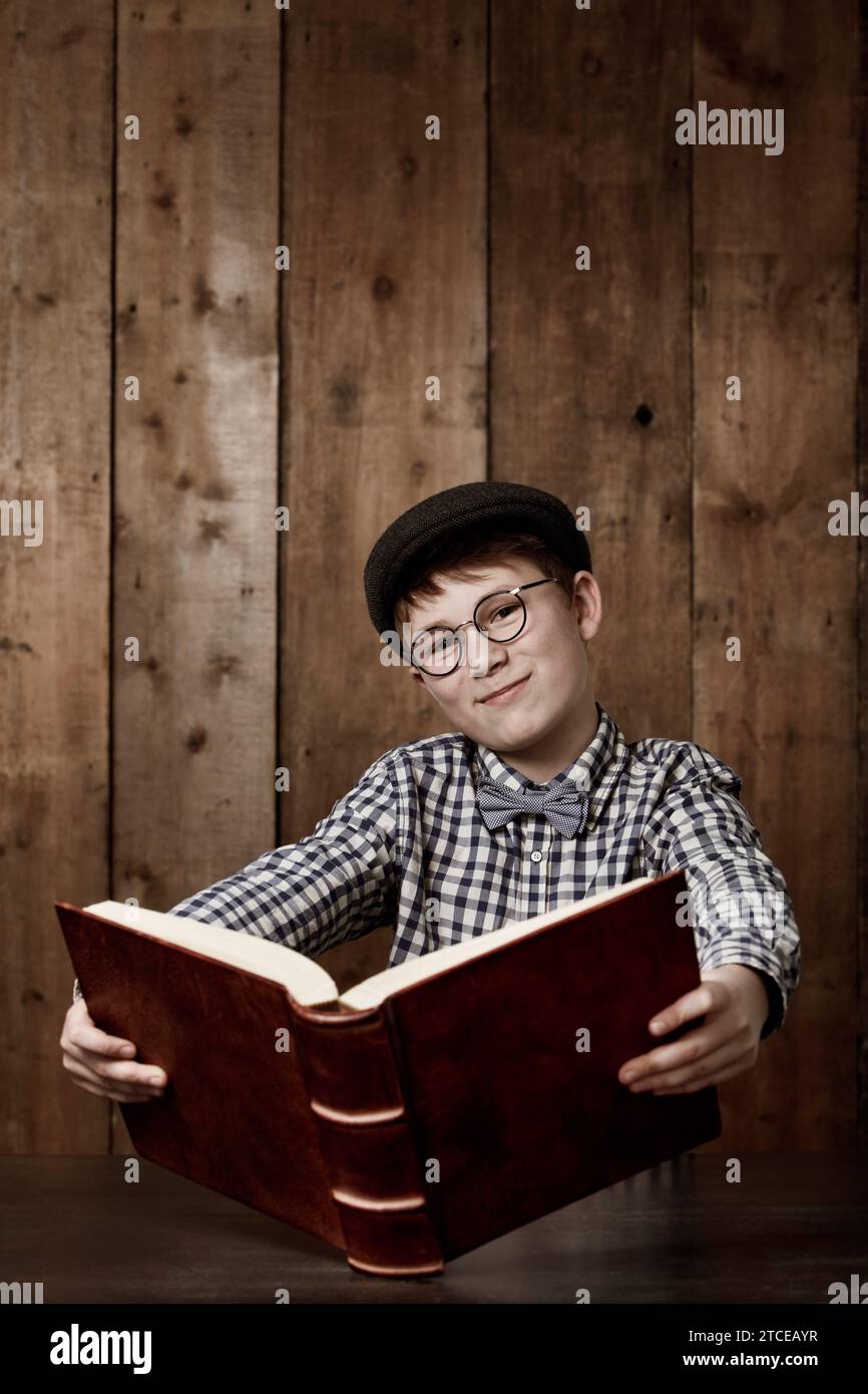 Education portrait, book and young child reading information ...