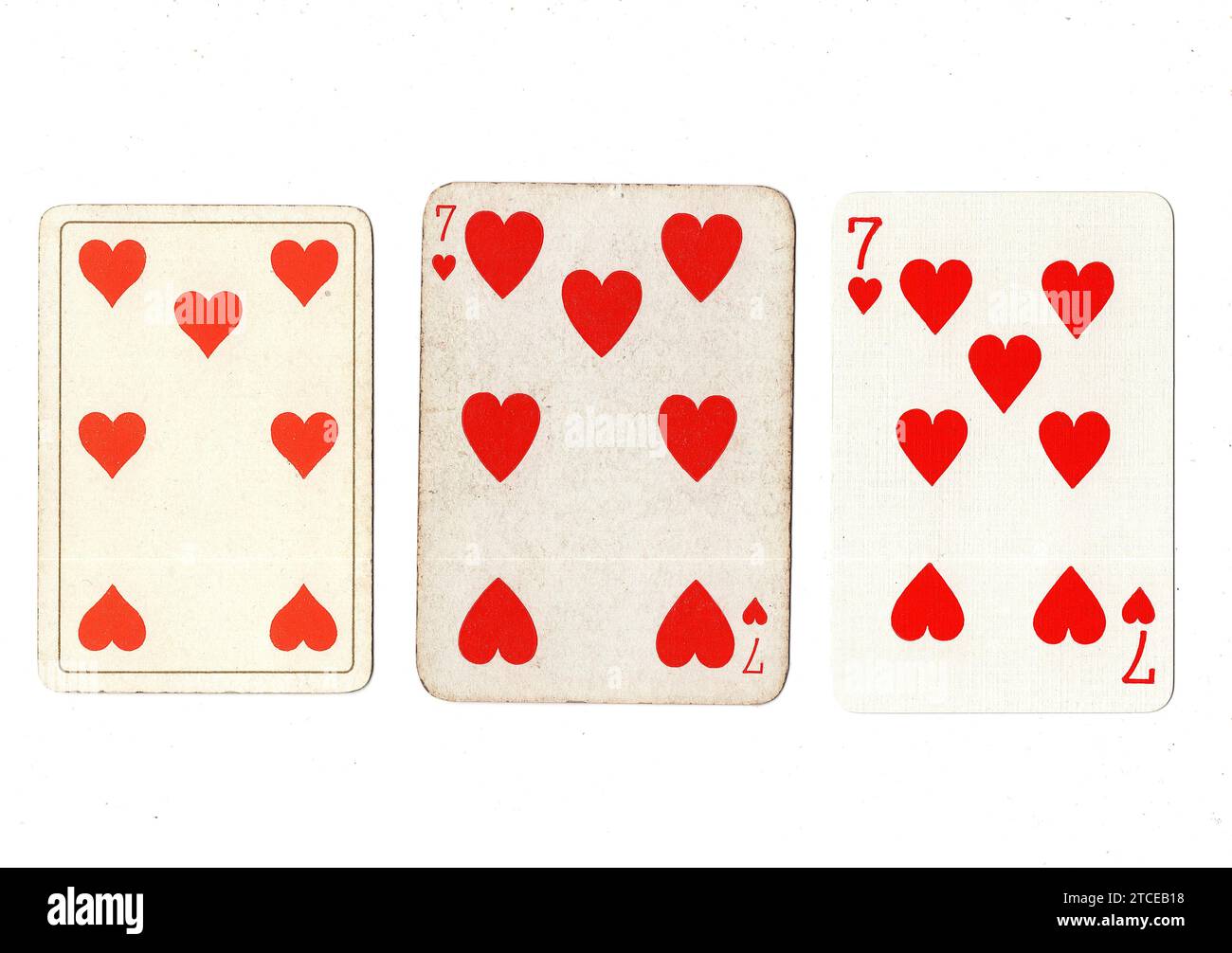 Three seven of hearts vintage/antique playing cards in various designs ...