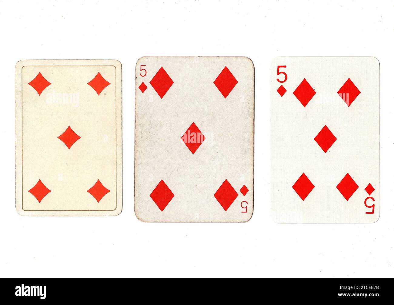 Three five of diamonds vintage/antique playing cards in various designs ...