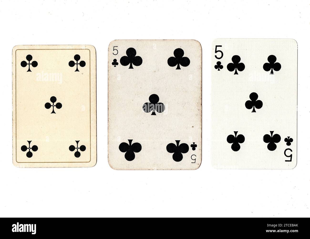 Three five of clubs vintage/antique playing cards in various designs ...