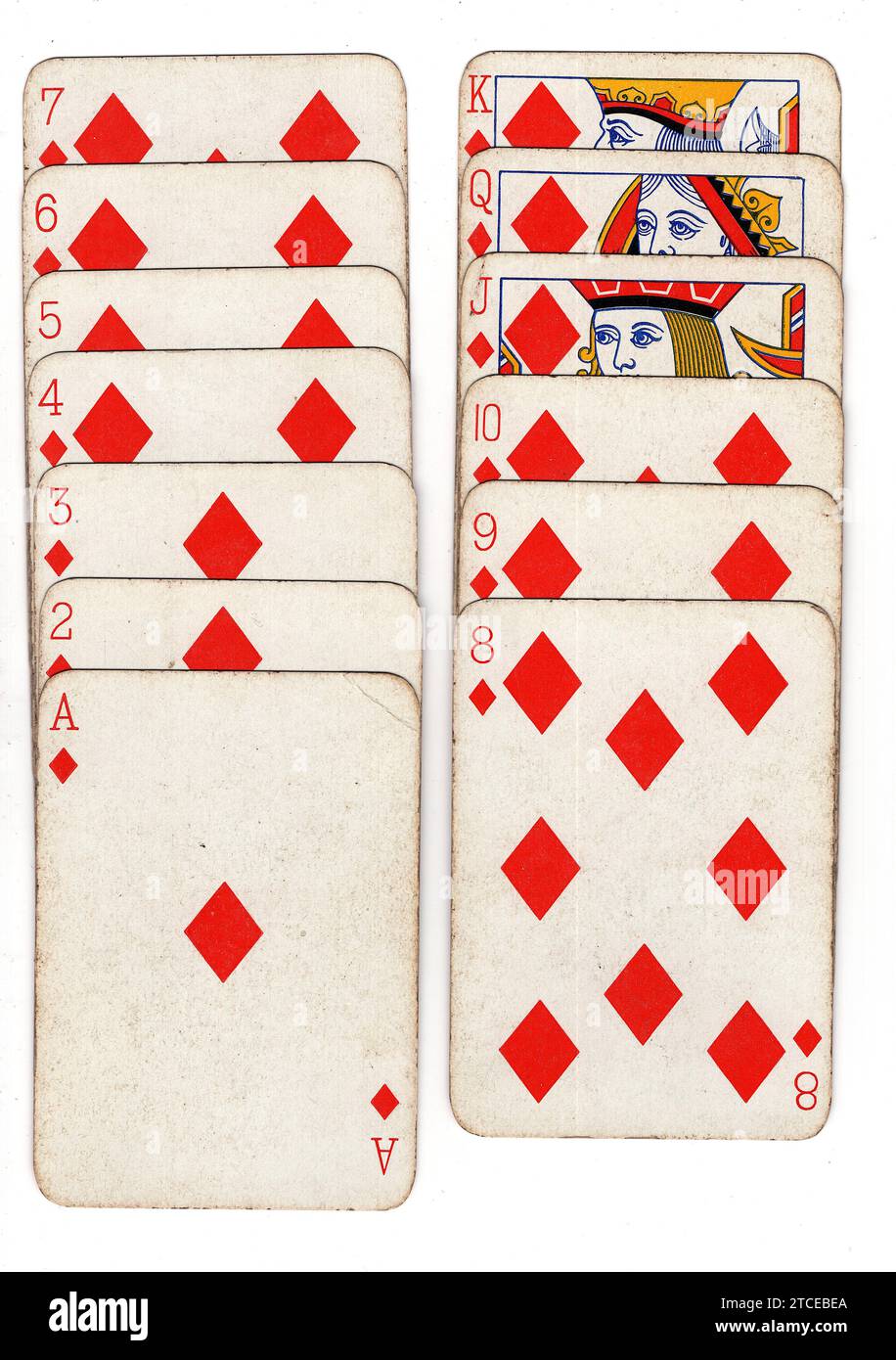 Vintage playing cards showing a full suit of diamonds isolated on a ...