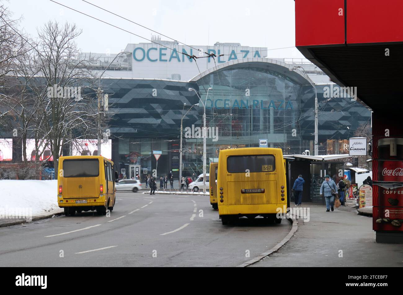 KYIV, UKRAINE - DECEMBER 12, 2023 - Shared taxis are parked at a stop ...