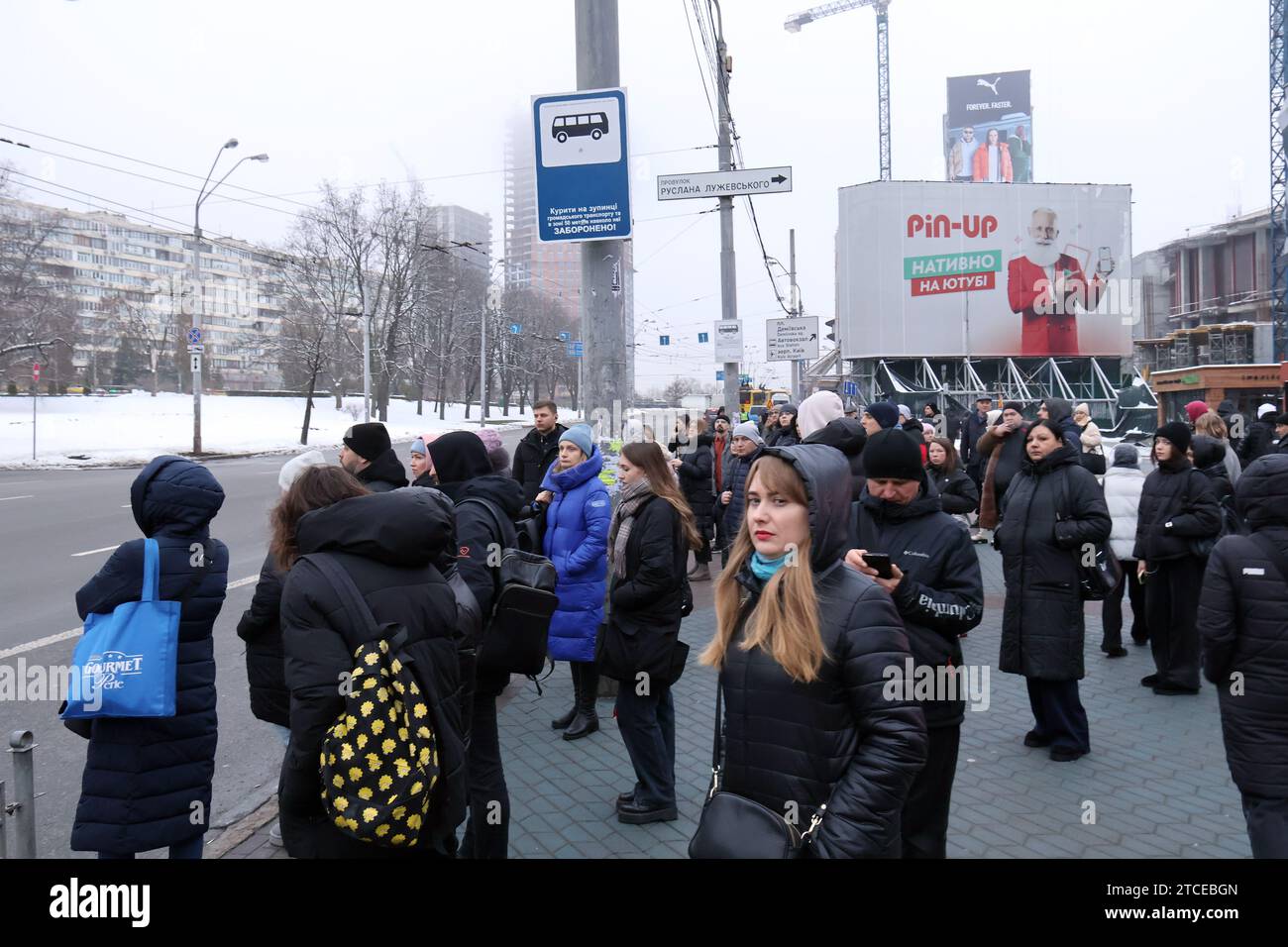 KYIV, UKRAINE - DECEMBER 12, 2023 - Commuters wait for an opportunity ...