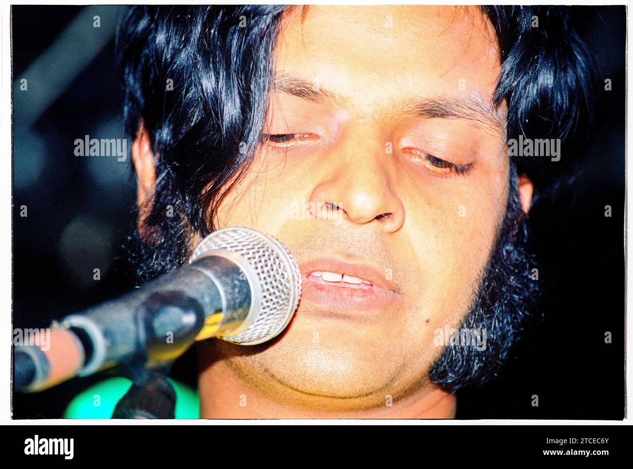 CORNERSHOP READING FESTIVAL 1997 Singer Songwriter Tjinder Singh Of cornershop-reading-festival-1997-singer-songwriter-tjinder-singh-of