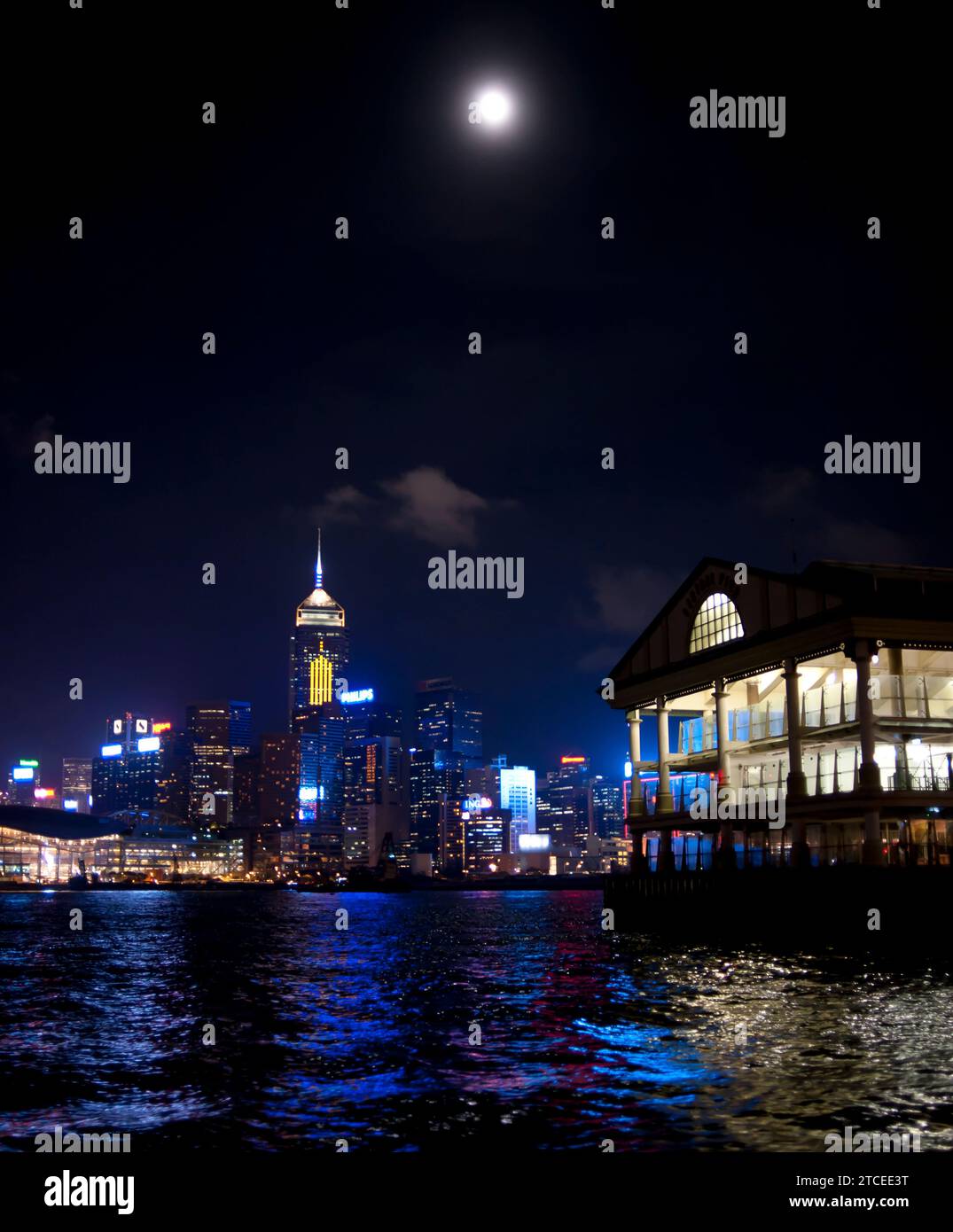 Night at the harbour ferry terminal, Hong Kong, China Stock Photo - Alamy