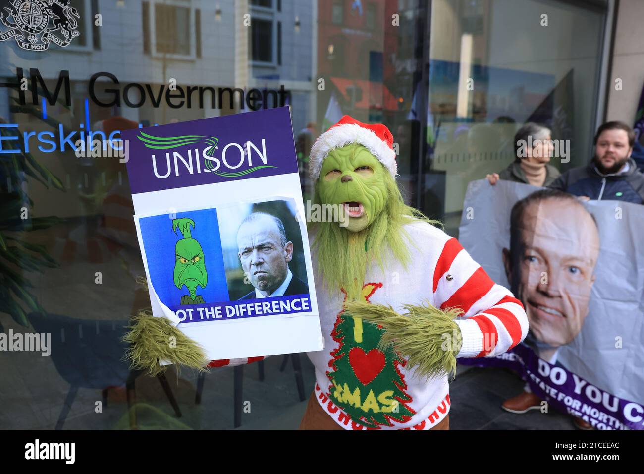 A person dressed as the Grinch outside Erskine House, Belfast, ahead of ...