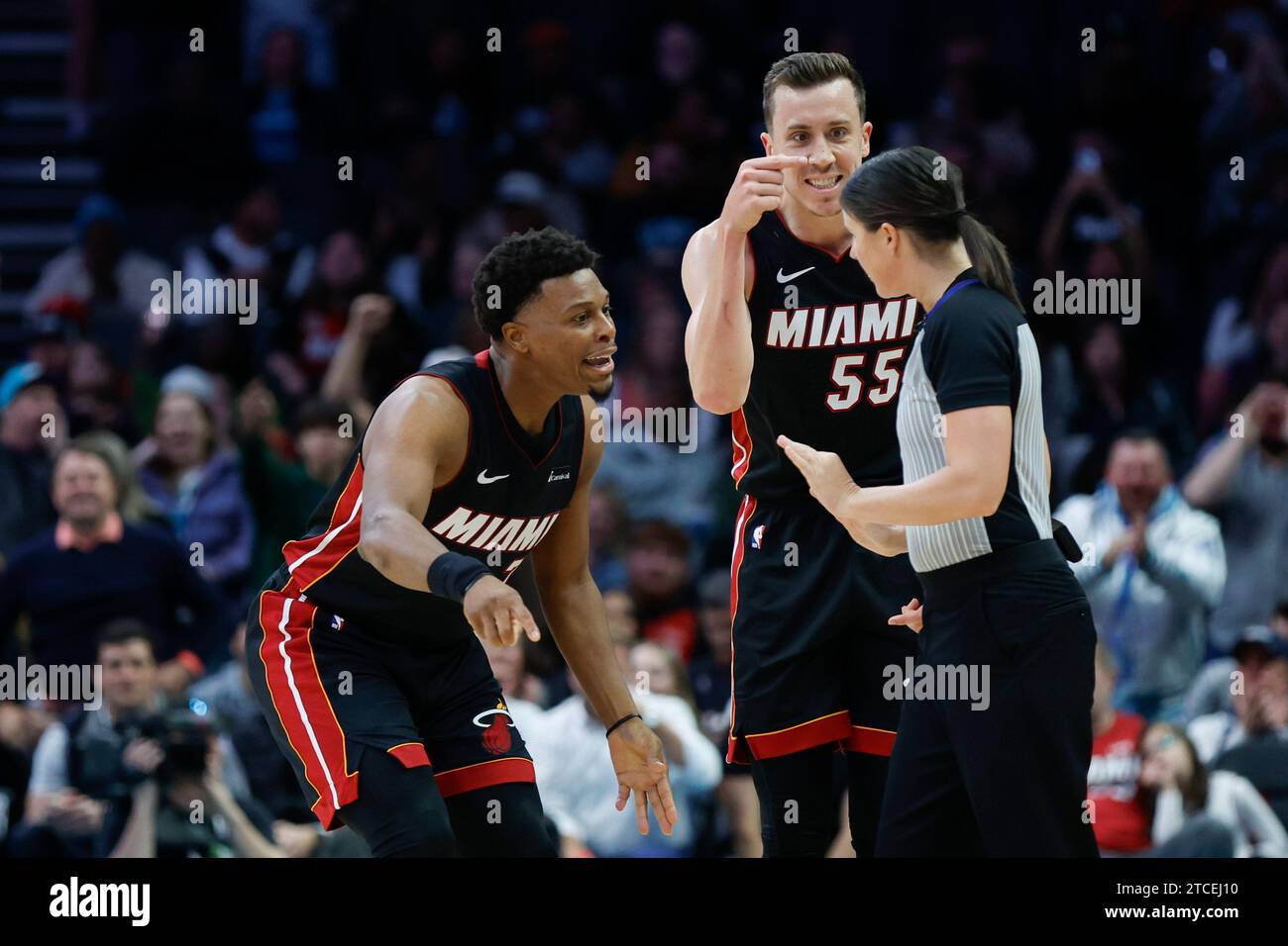 Miami Heat guard Kyle Lowry, left, and forward Duncan Robinson argue ...