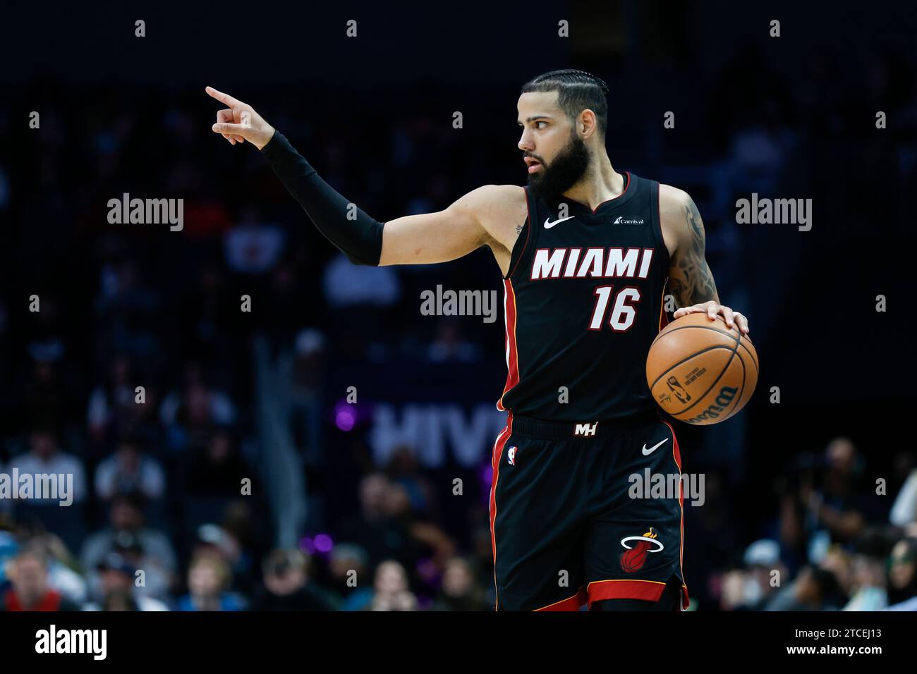 Miami Heat forward Caleb Martin brings the ball upcourt during the ...