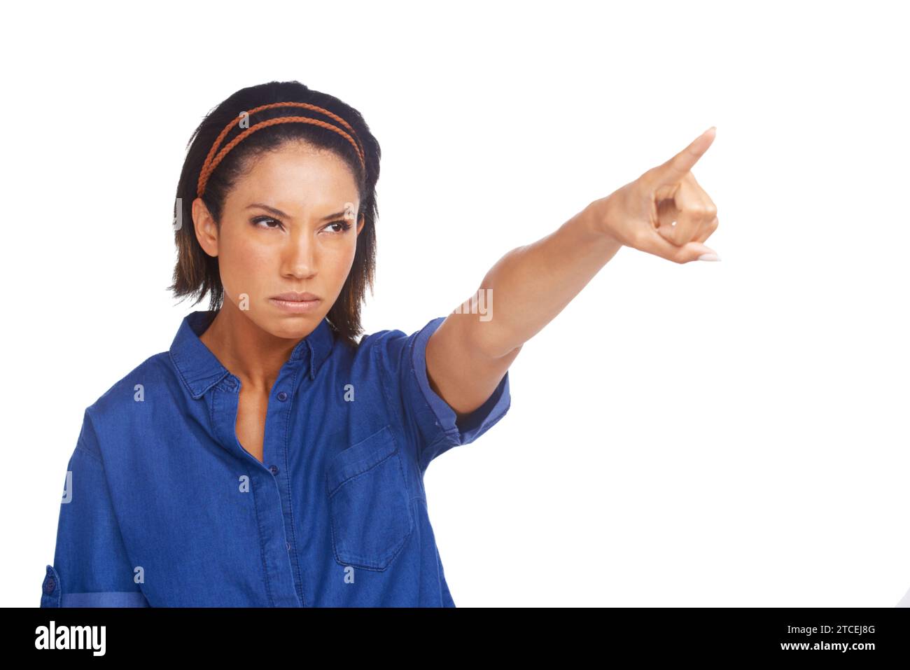 Woman, pointing and angry in studio or white background for frustrated ...