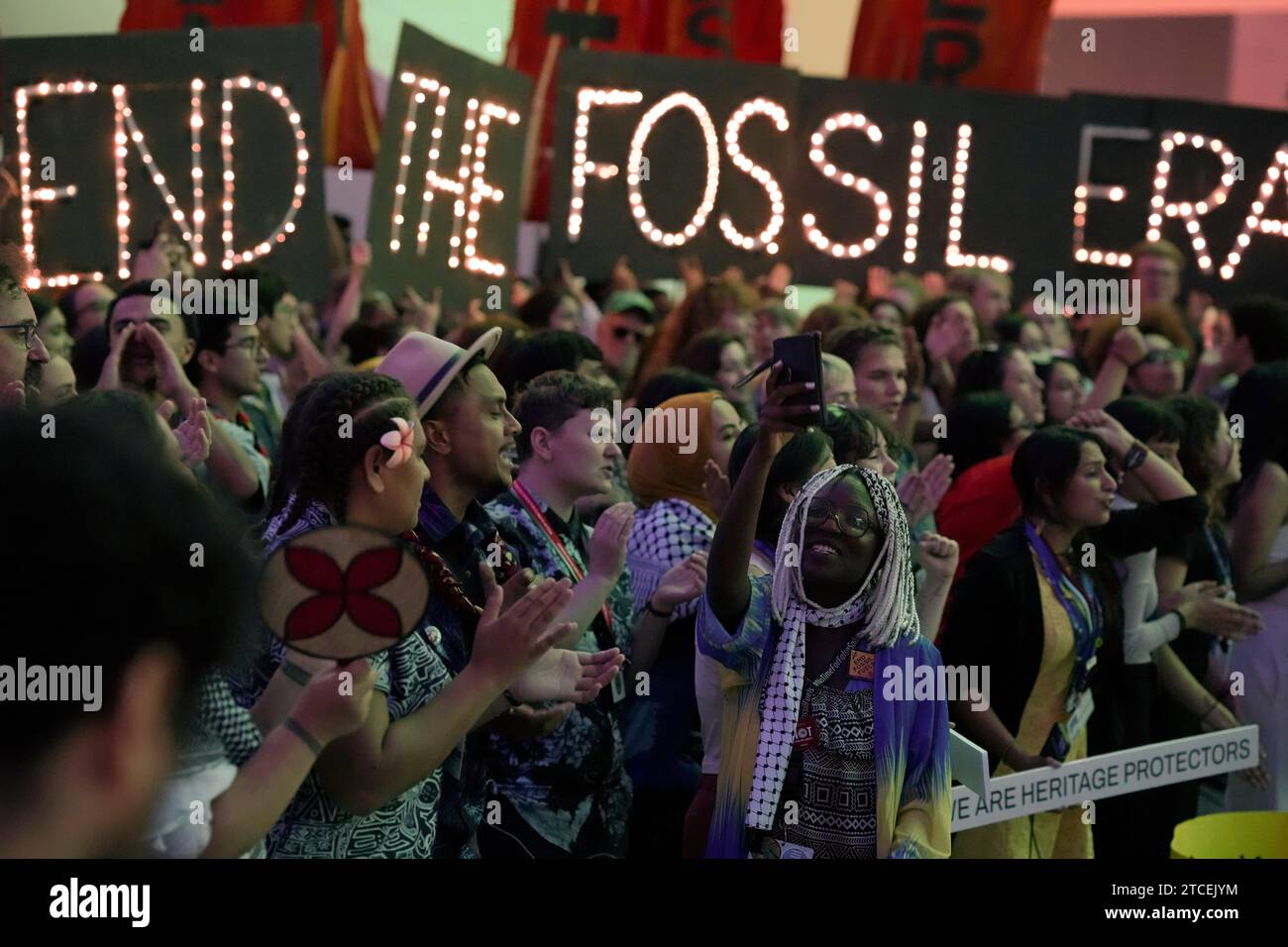 Activist Ina-Maria Shikongo takes photos during a demonstration to end ...