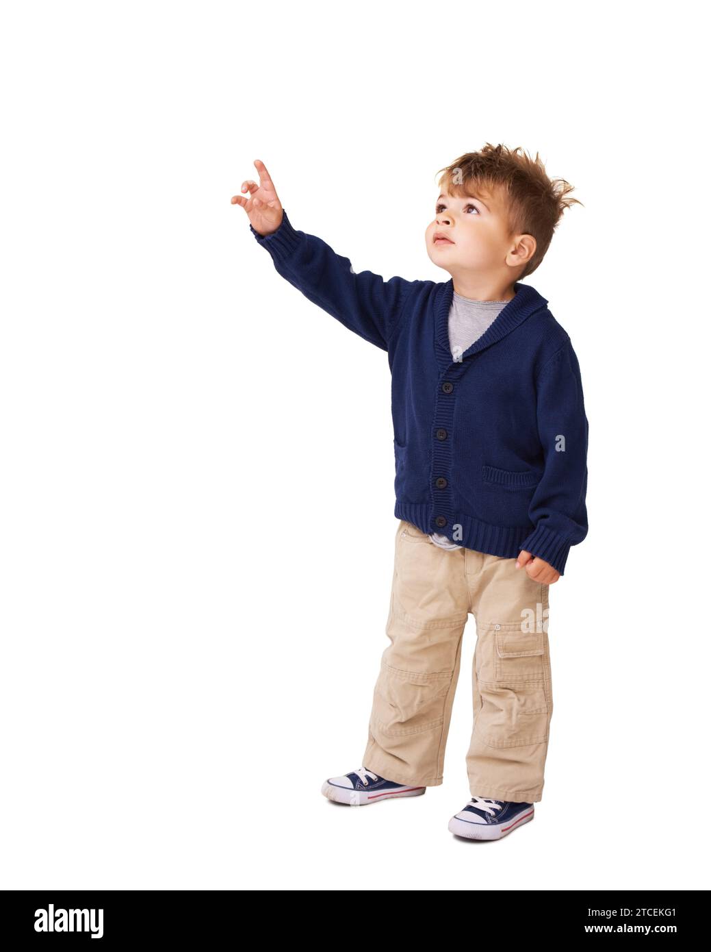 Mockup, space and child pointing up in studio isolated on a white ...