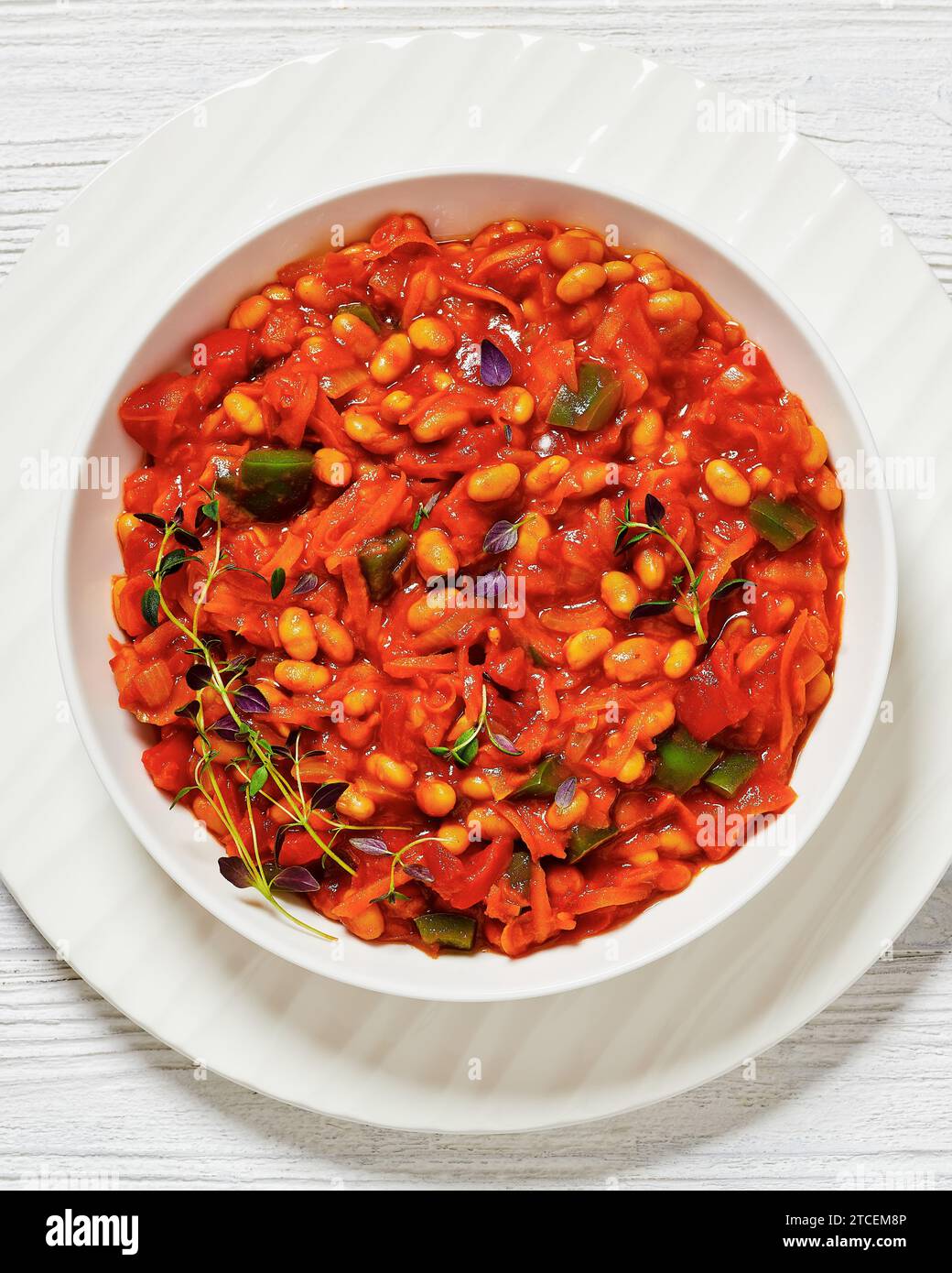 chakalaka, refreshing spicy tomato bean relish in white bowl on white ...