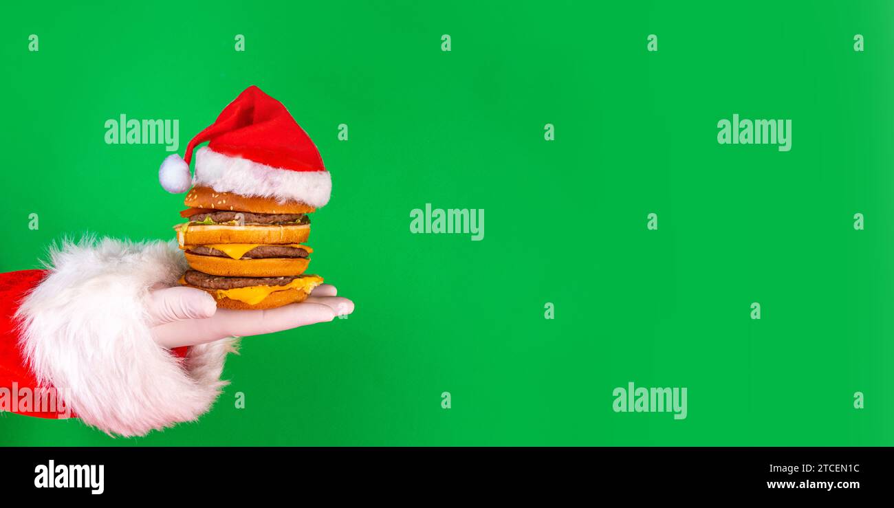 Christmas burger and french fries delivery menu. Santa hands with big ...