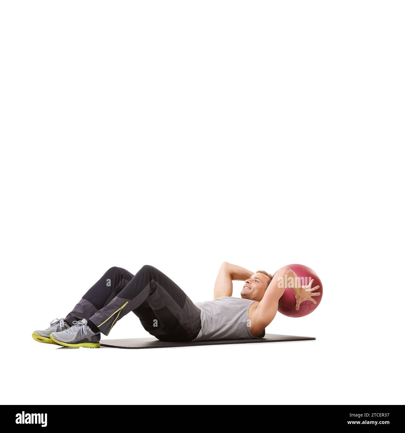Man, medicine ball and sit up for workout exercise in studio on white ...